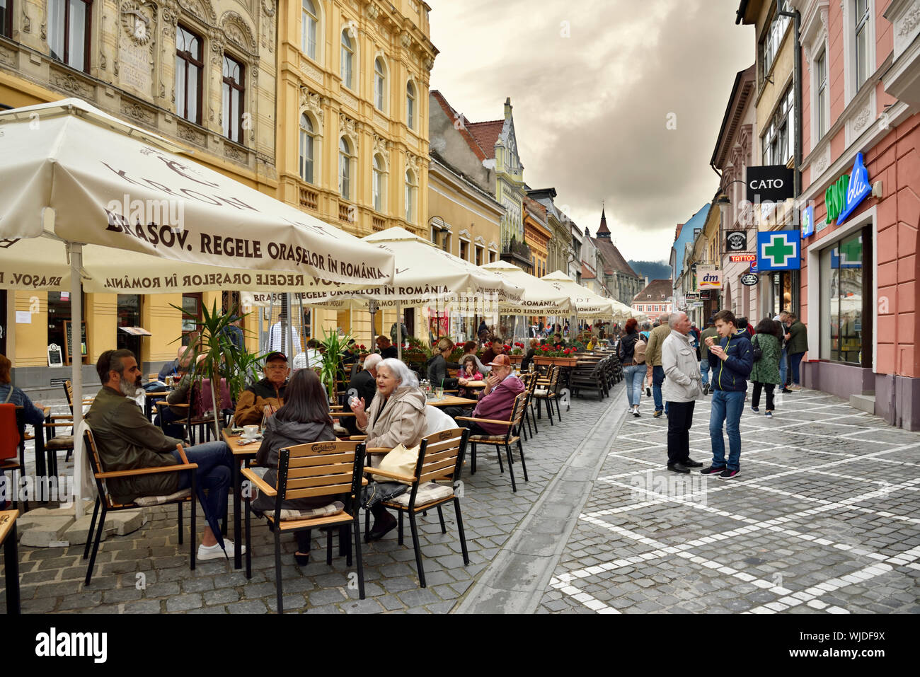 Republicii street, the main pedestrian and shopping street in Brasov ...