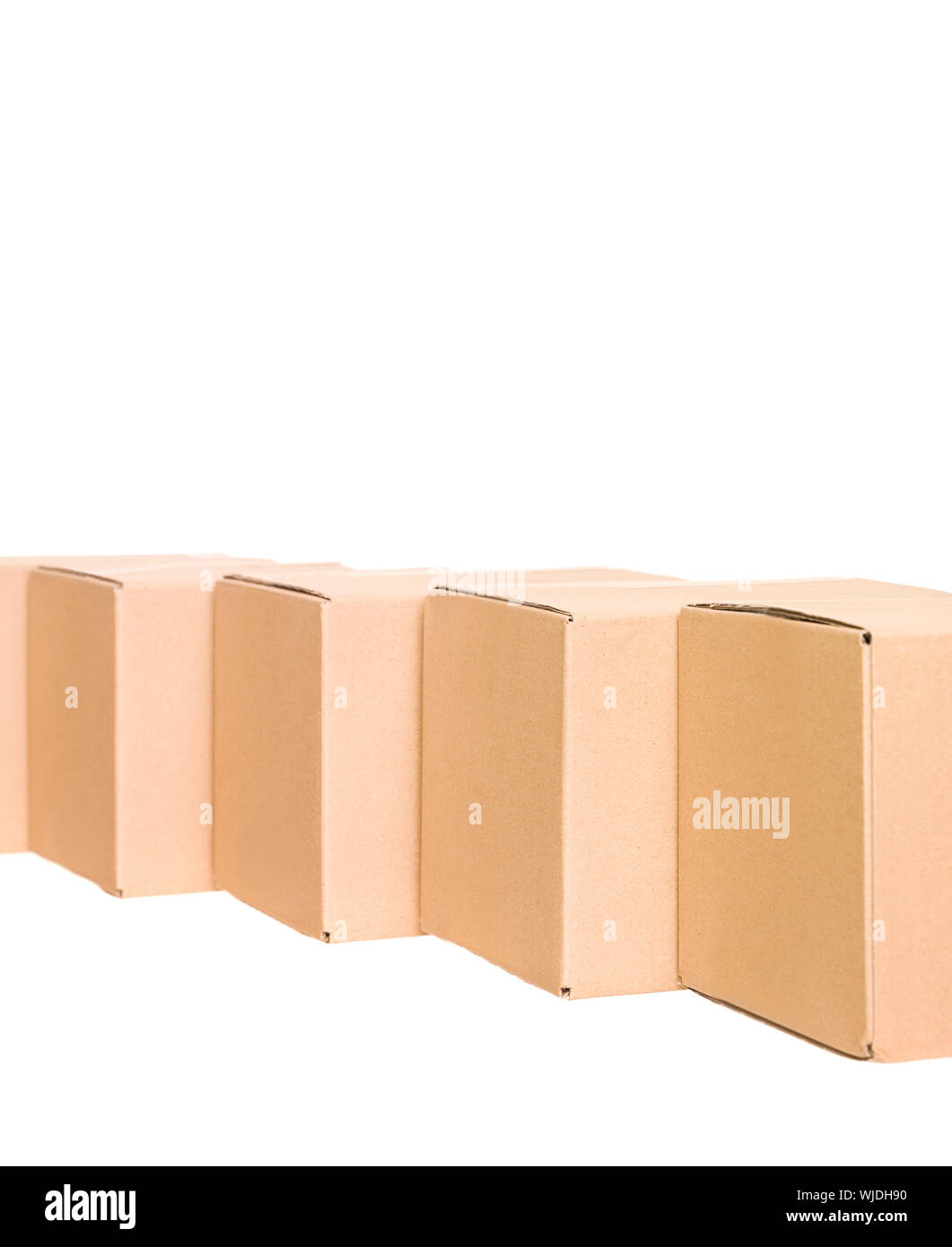 Cardboard boxes in a row isolated on white background Stock Photo - Alamy