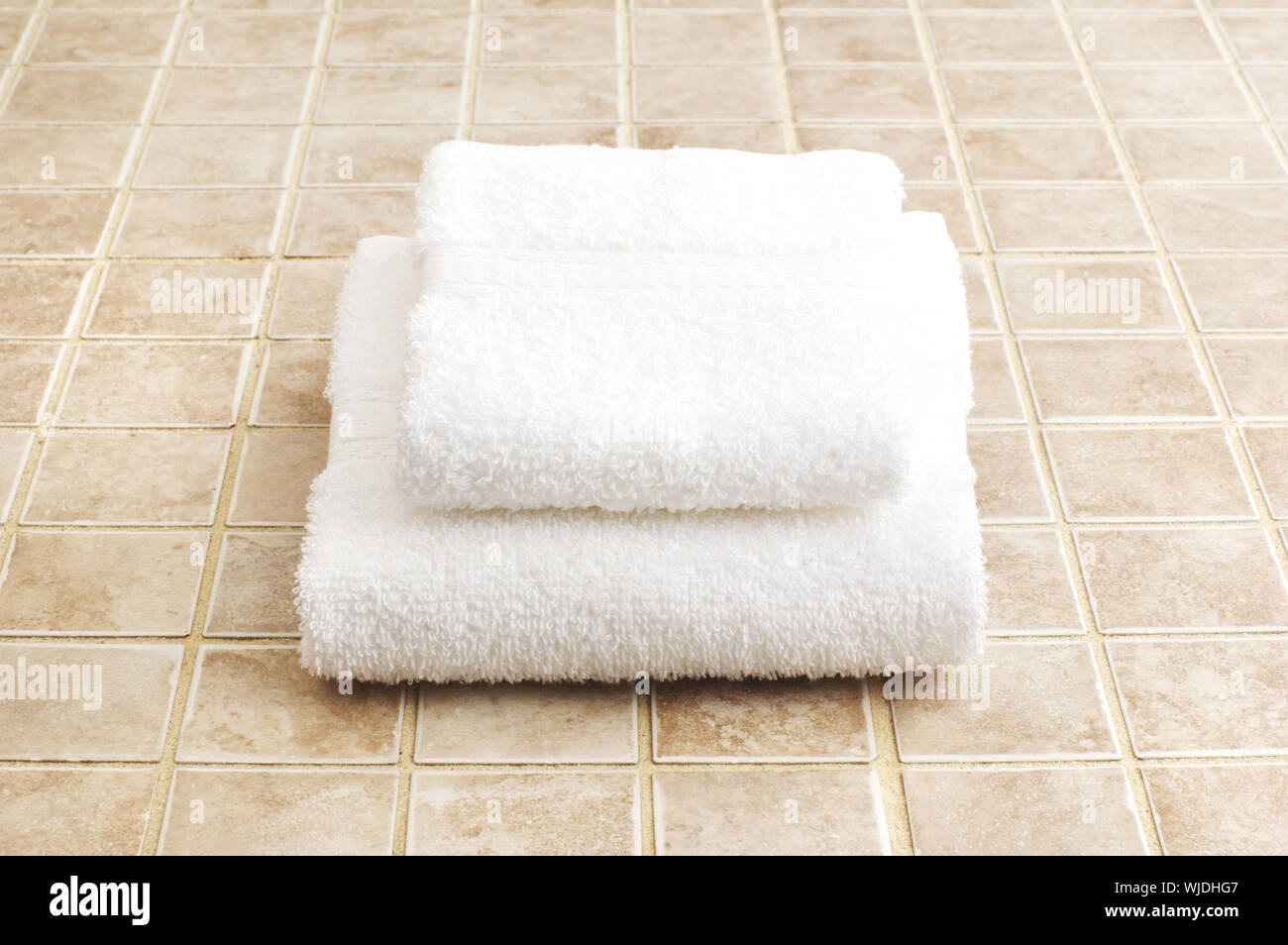 Bathroom object photographed against a stone tile backdrop Stock Photo ...