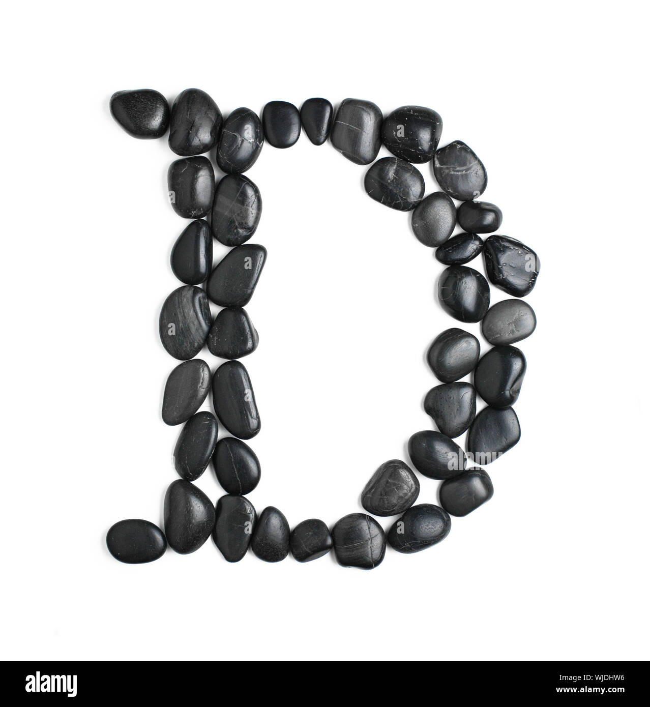 Black rock letter photographed against a white background Stock Photo ...