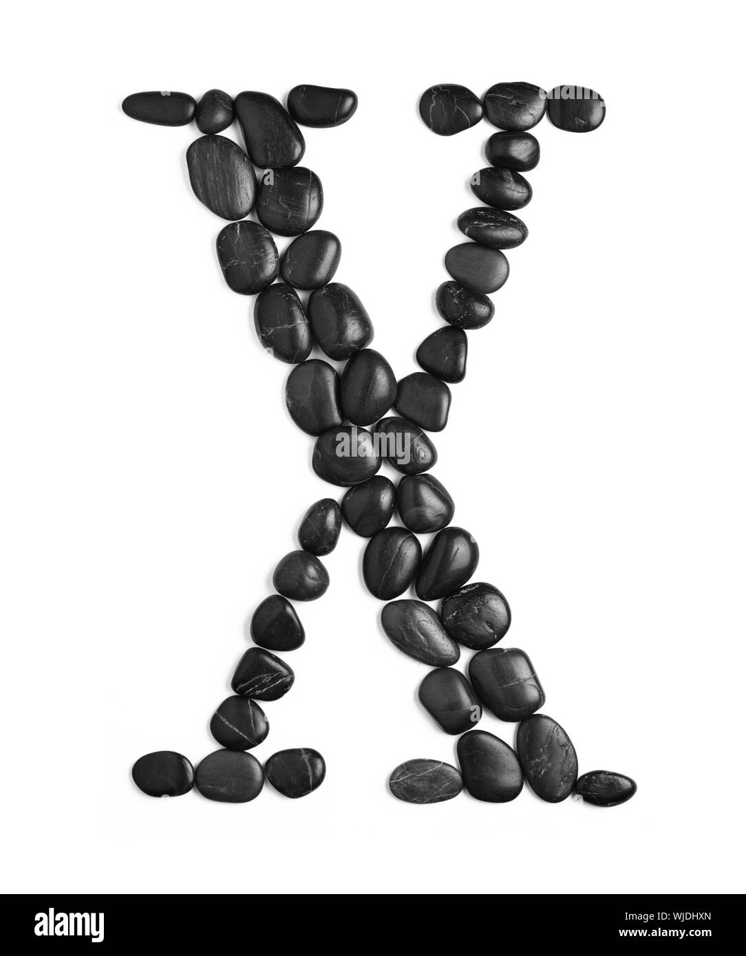 Black rock letter photographed against a white background Stock Photo ...