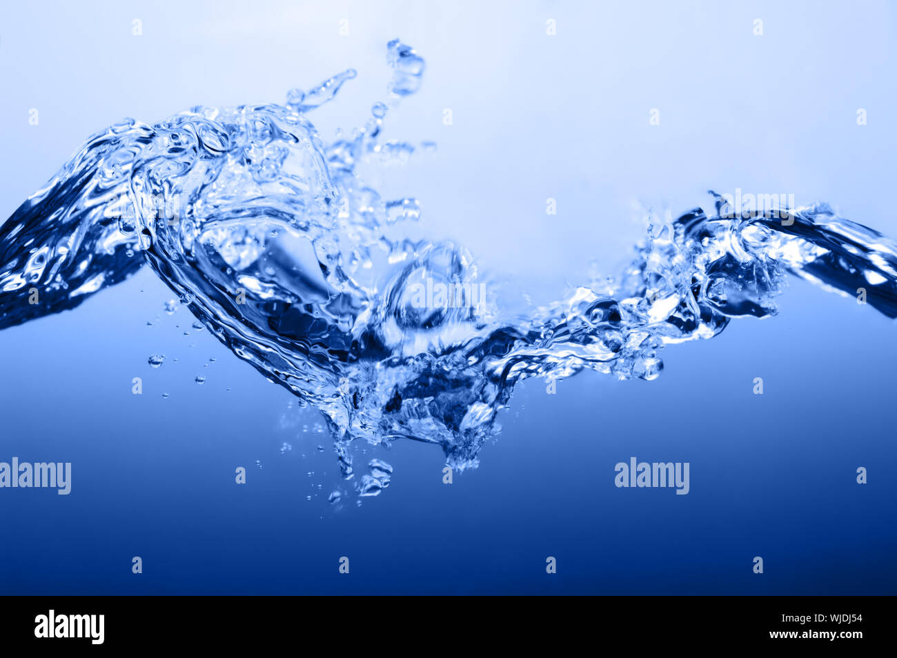 Crisp clear water photographed high speed Stock Photo - Alamy