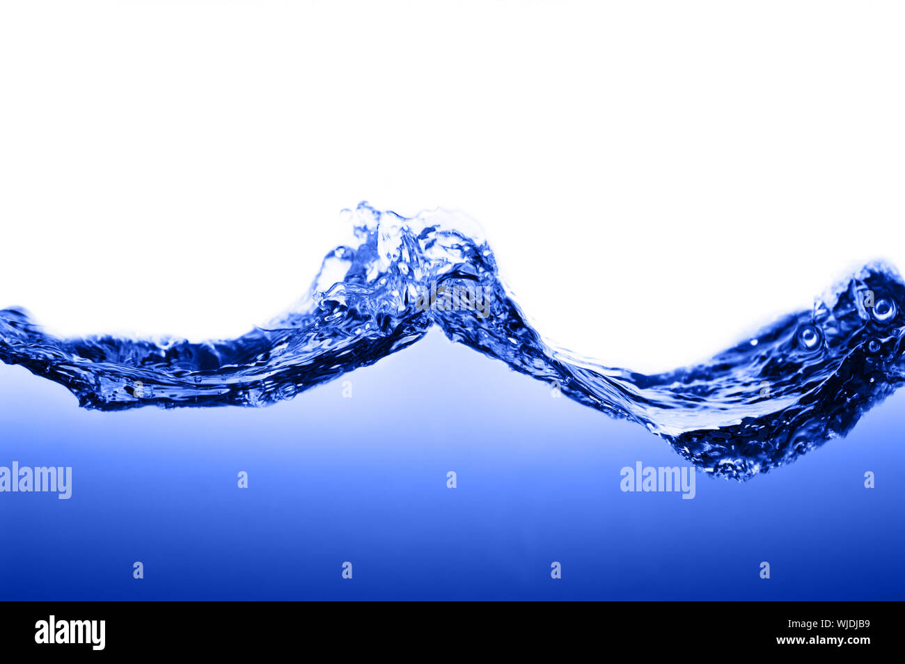 Crisp, clear, blue water photographed against white Stock Photo - Alamy