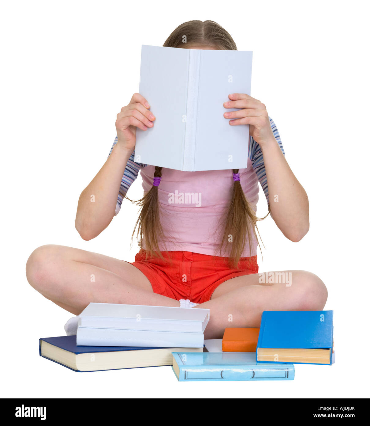 Girl reading the book on the white background Stock Photo - Alamy