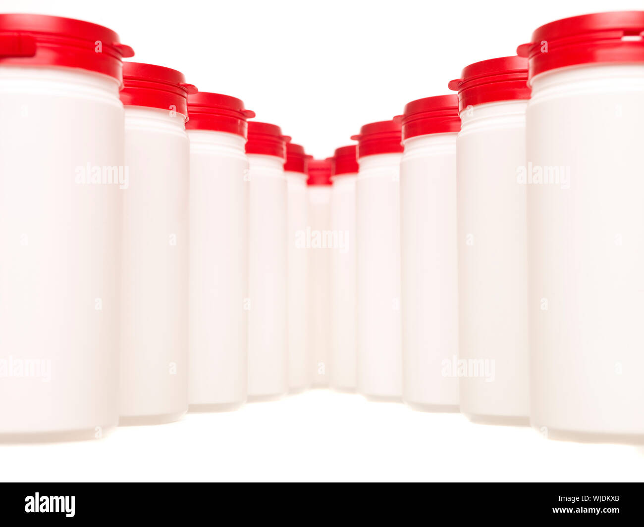 Formation of Plastic cans isolated on white background Stock Photo - Alamy