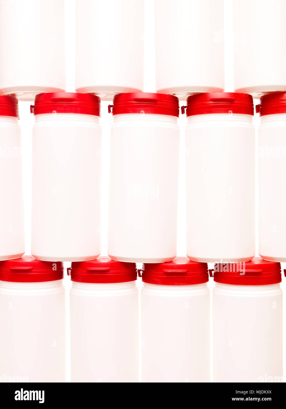 Formation of Plastic cans isolated on white background Stock Photo - Alamy