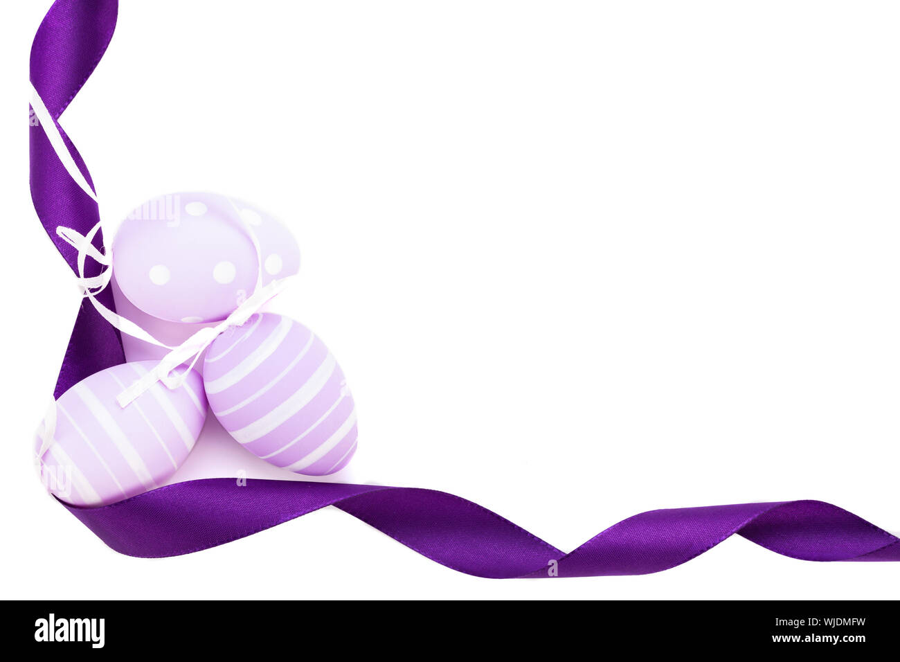 Easter background with three traditional eggs, painted in pastels, with ...