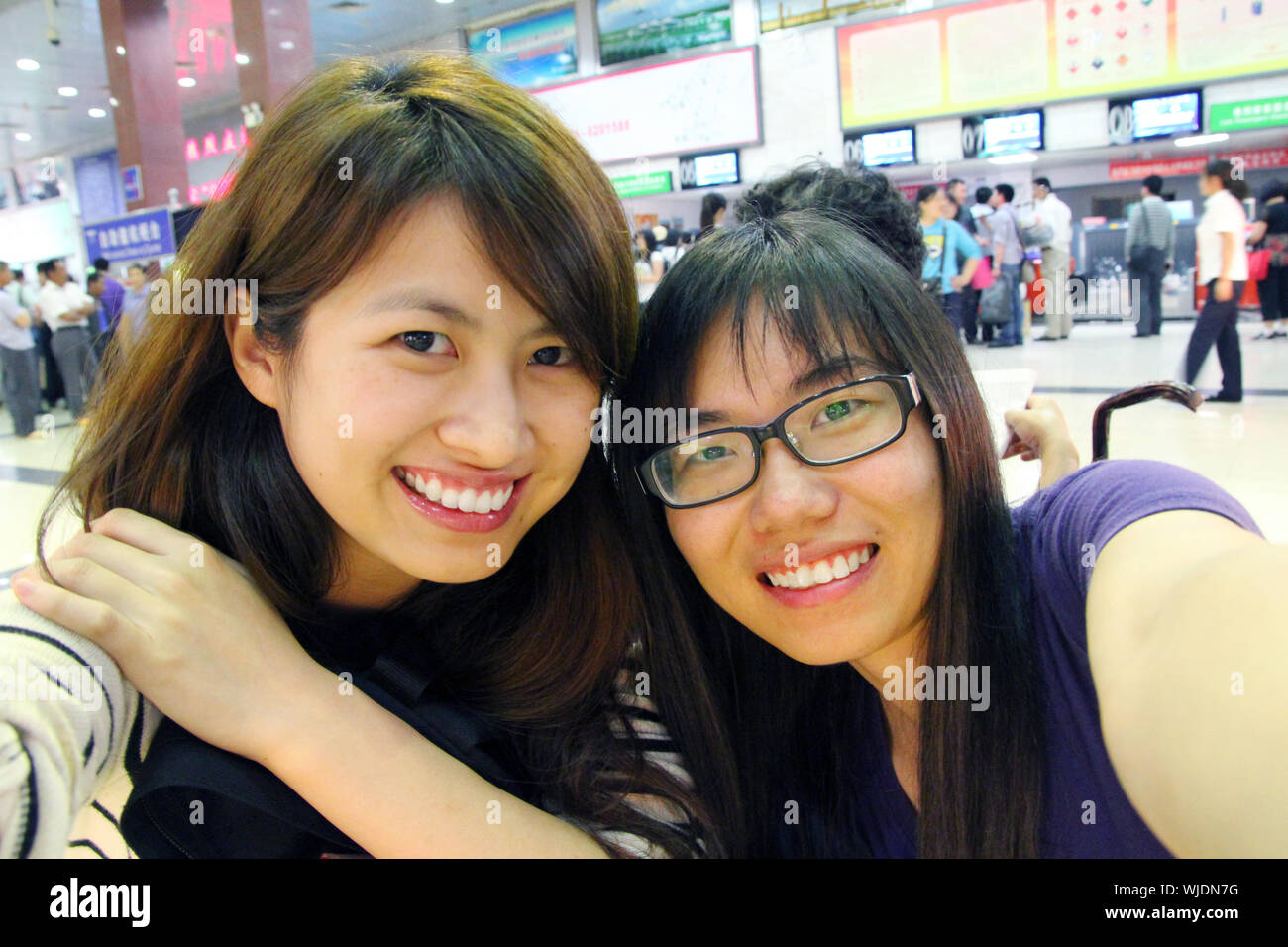 Asian friends with lovely smile Stock Photo - Alamy
