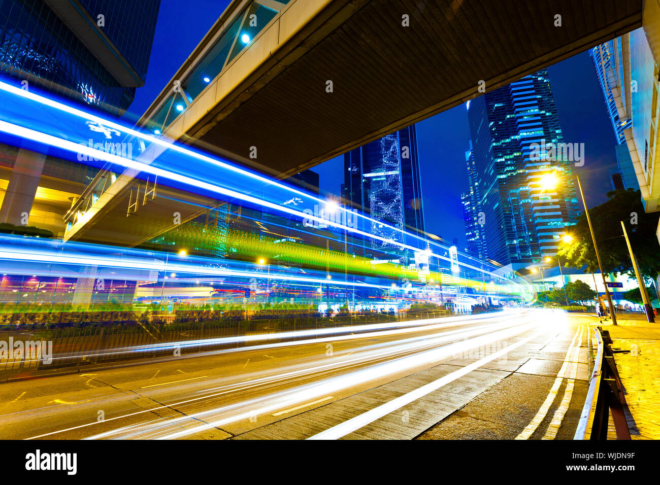 Traffic in downtown city at night Stock Photo - Alamy