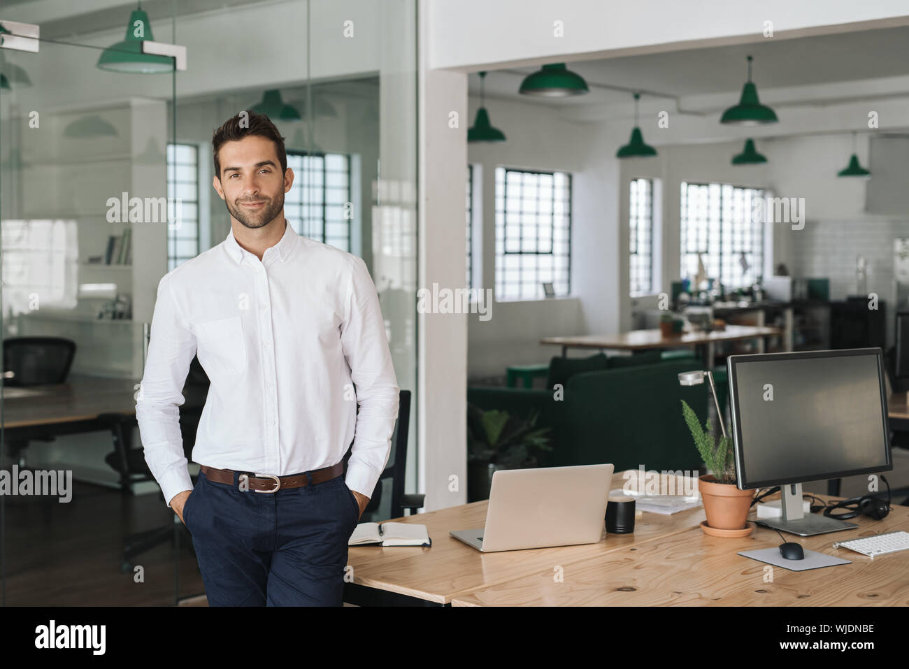 Business man in workplace standing hi-res stock photography and images ...