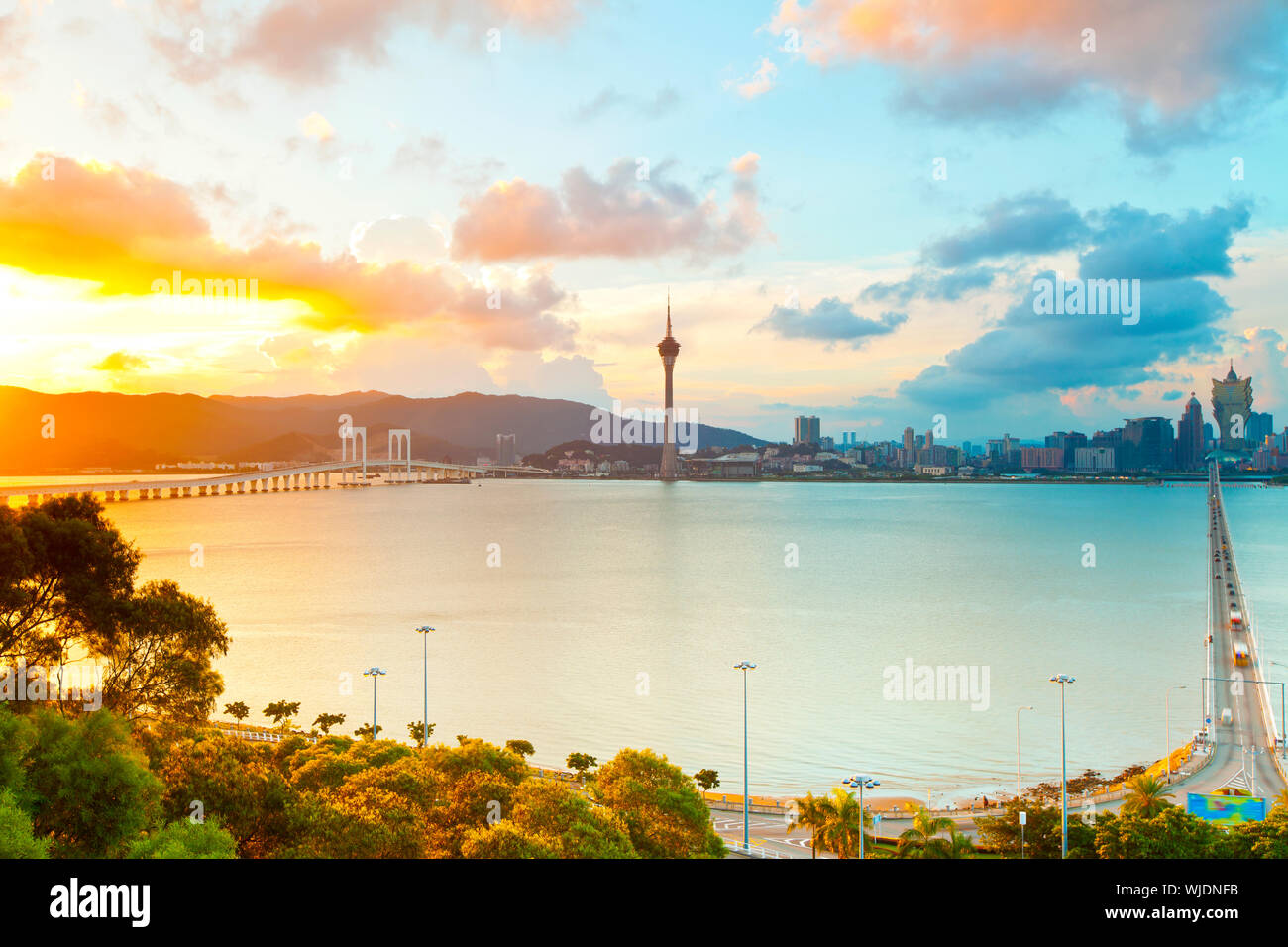 Macau city at sunset Stock Photo - Alamy
