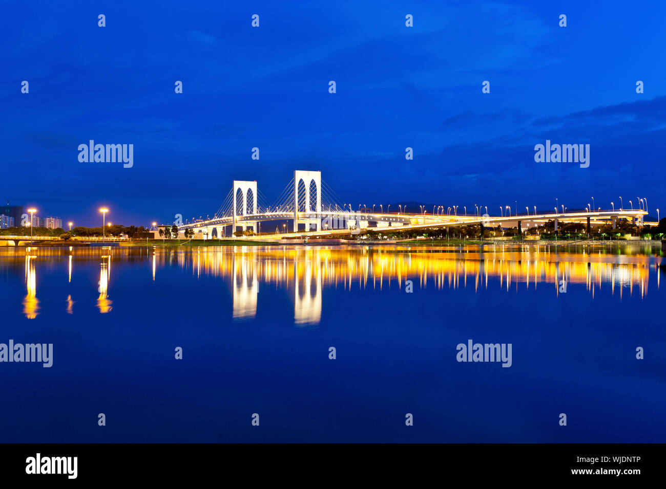 Bridge in Macau at night Stock Photo - Alamy