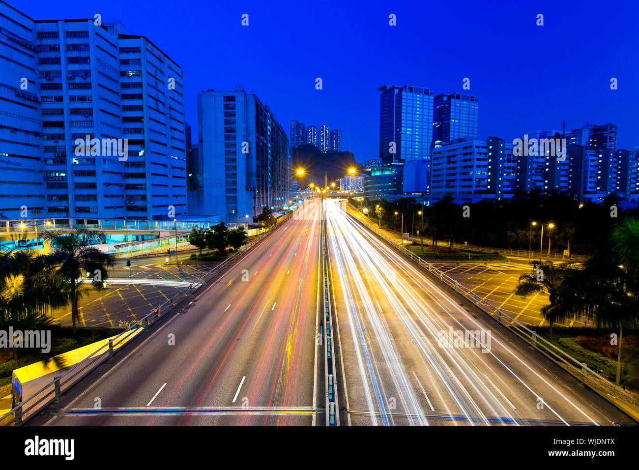 Moving cars on highway at night Stock Photo - Alamy