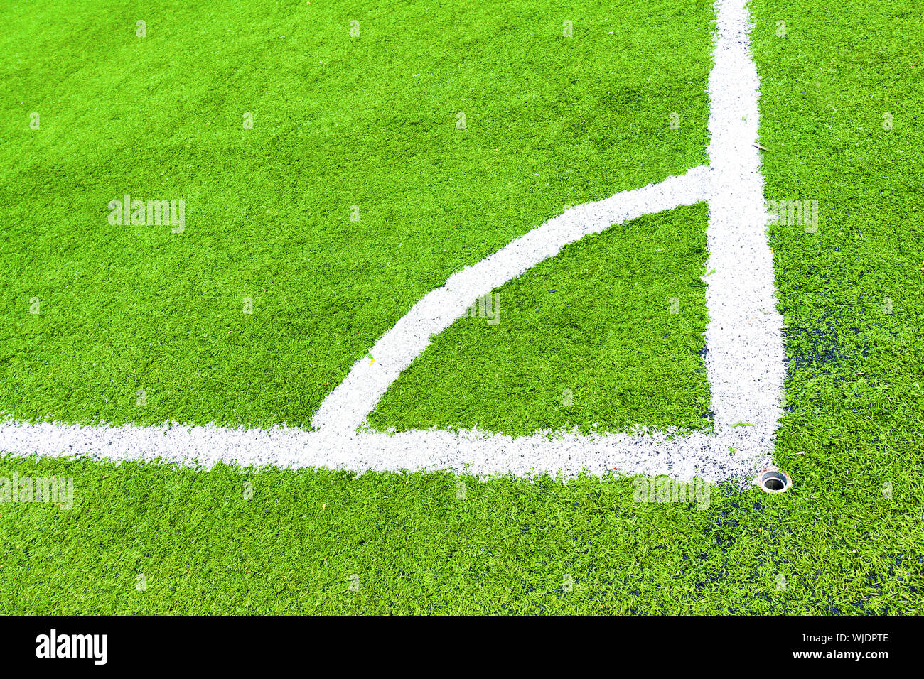 Corner of a synthetic football field Stock Photo - Alamy