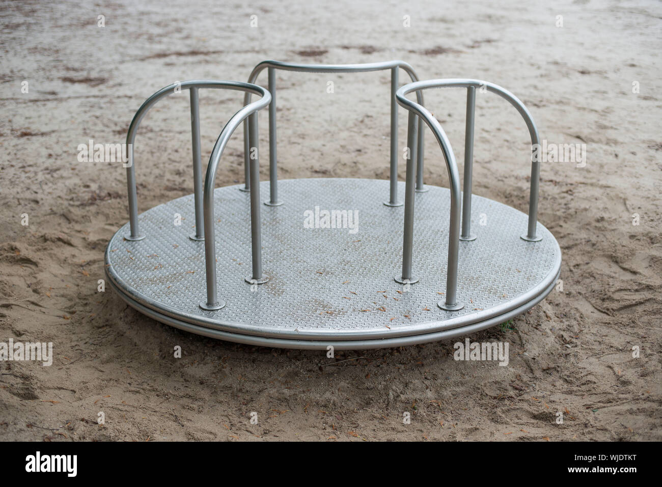 Merry go round playground hi-res stock photography and images - Alamy