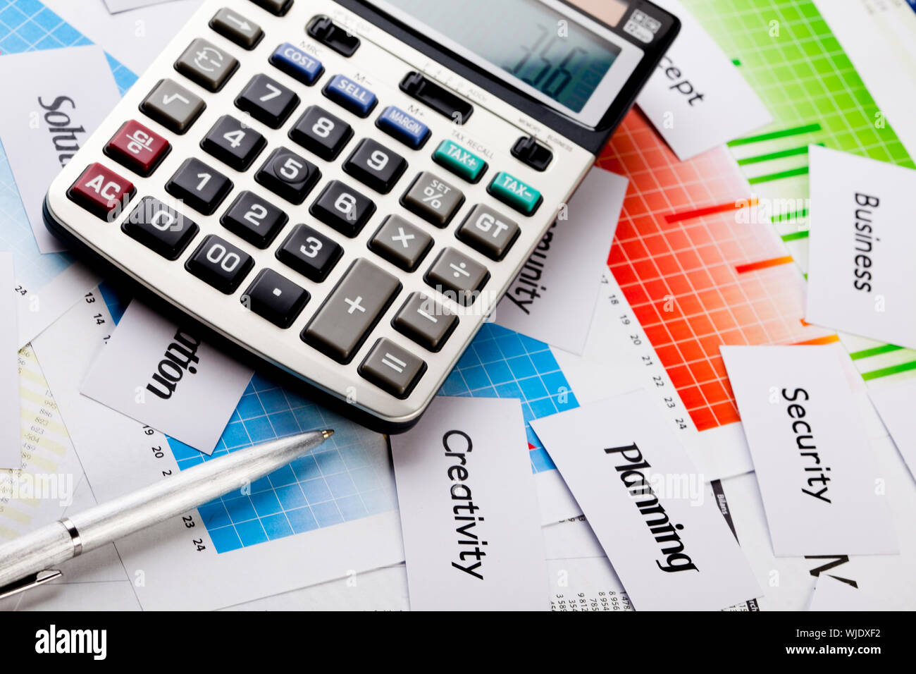 Diagram and calculator Stock Photo - Alamy