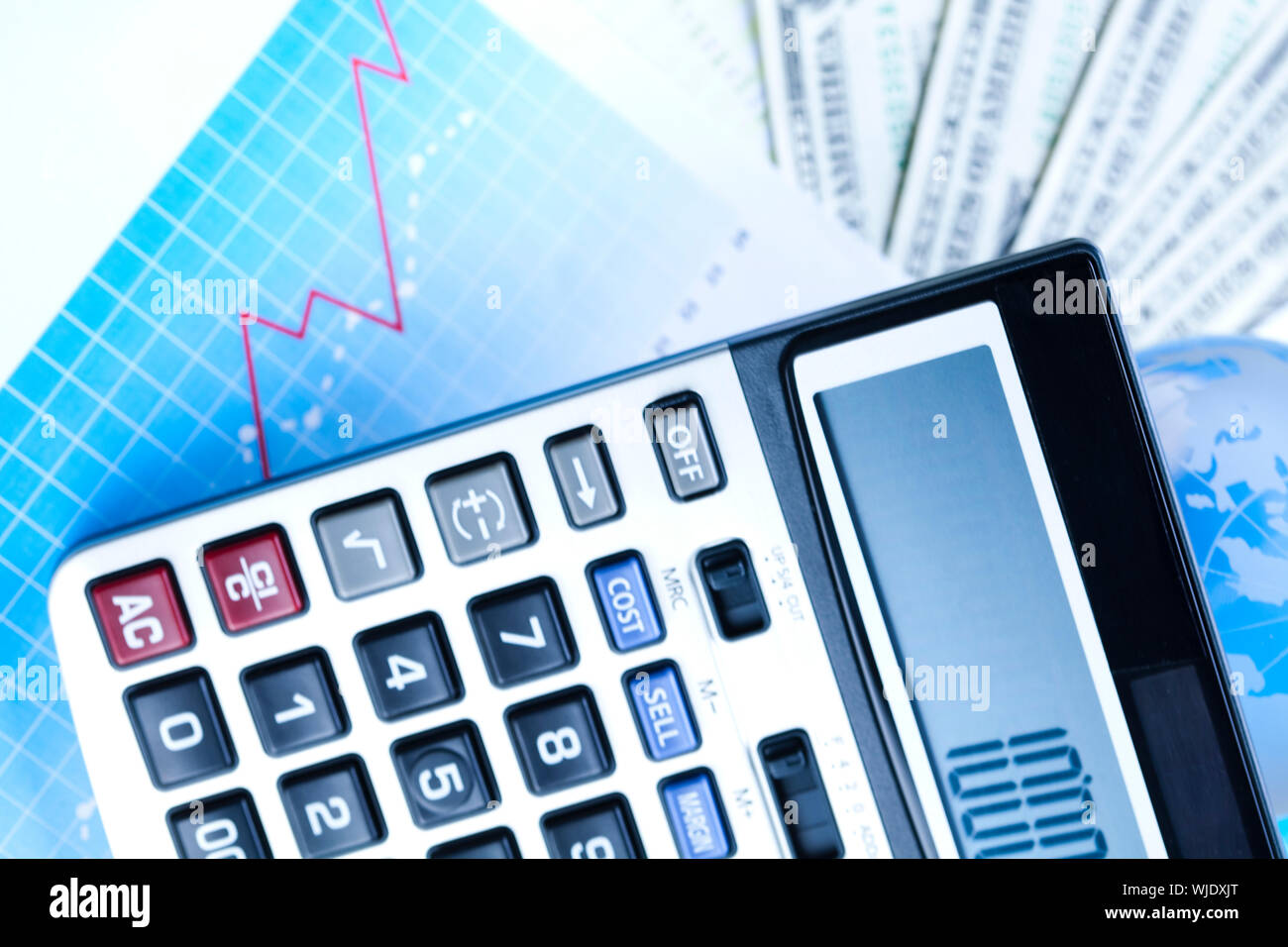 Calculator and diagram Stock Photo - Alamy