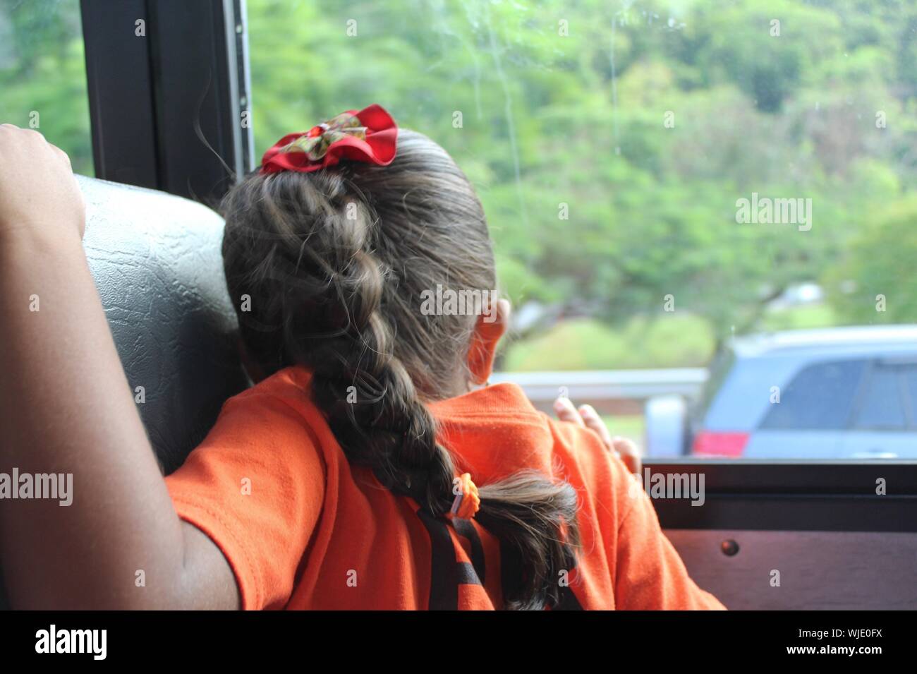 Girls bus window hi-res stock photography and images - Alamy