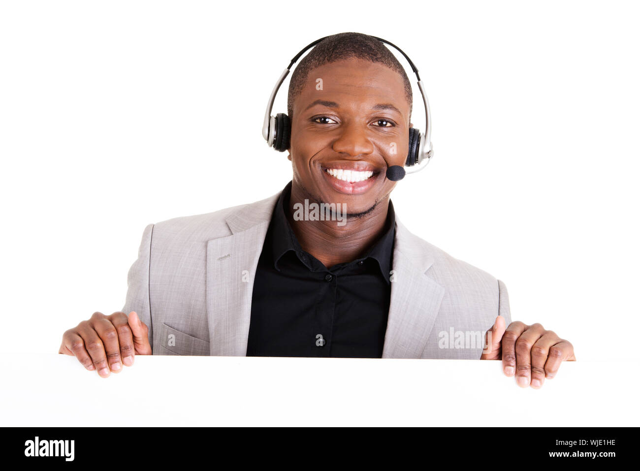 Successful call center worker with blank board, isolated on white Stock ...