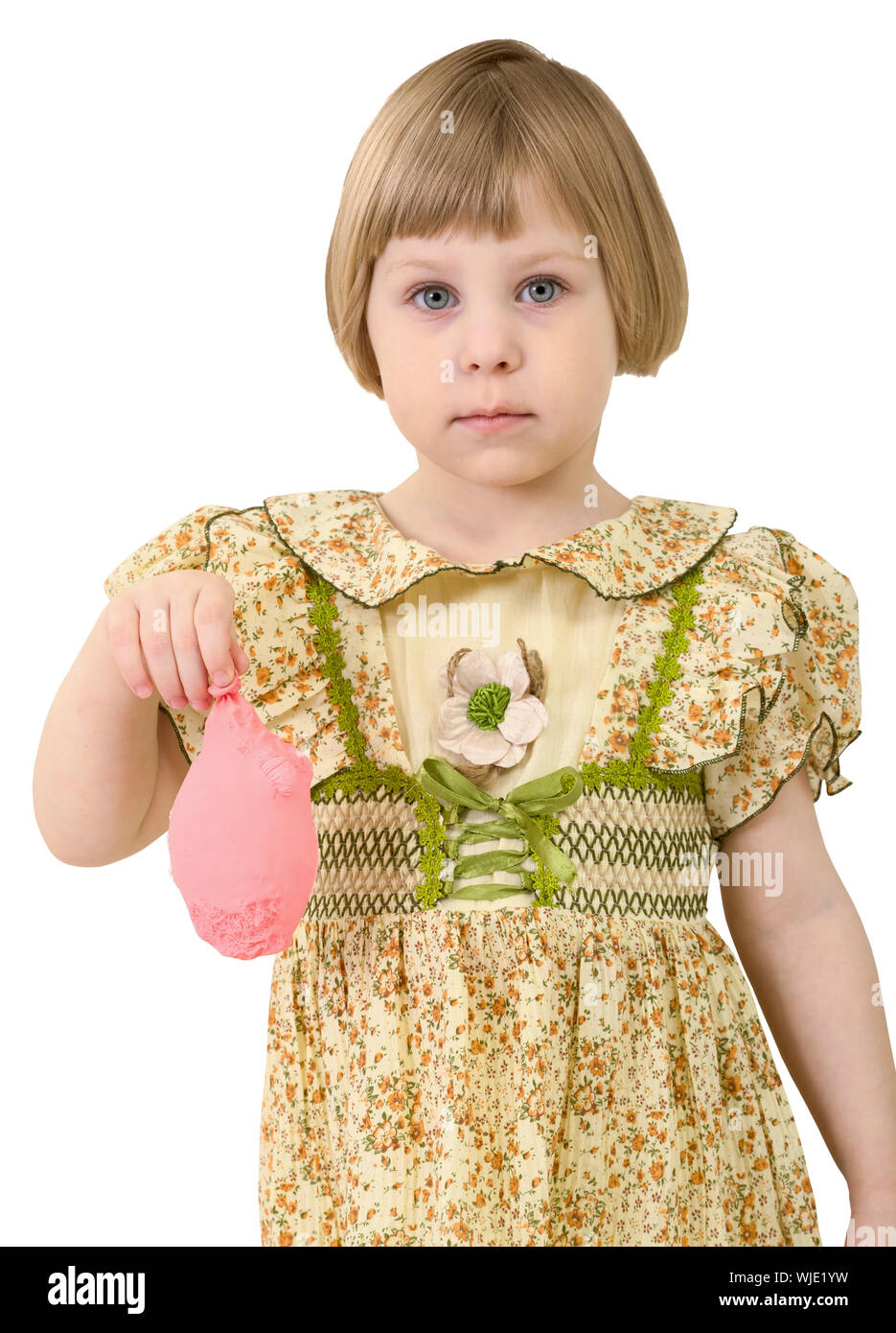 Sad very little girl with blow off pink balloon Stock Photo - Alamy
