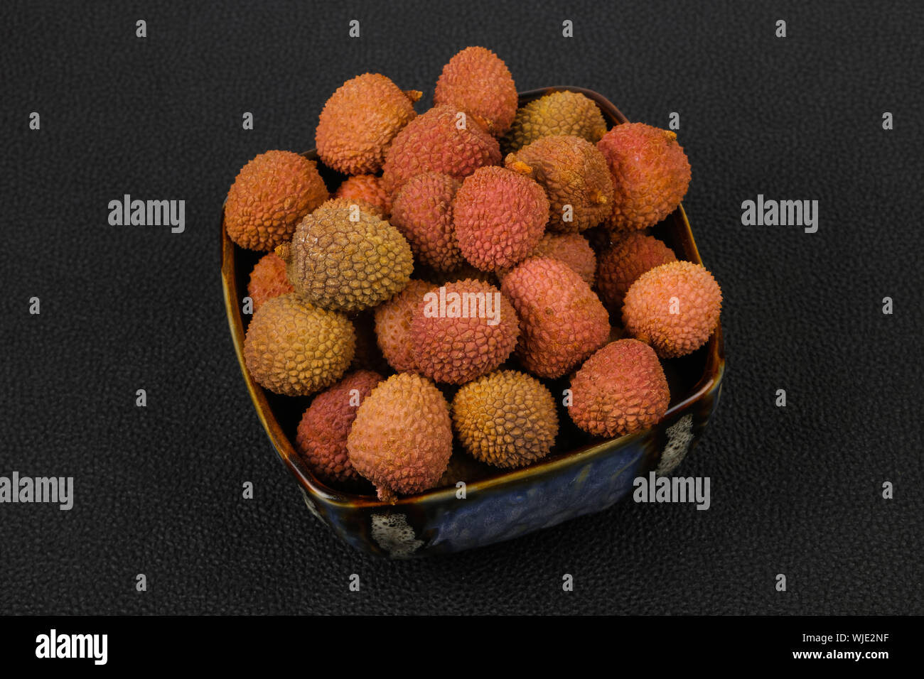 Tropical fruit lychee in the bowl Stock Photo - Alamy