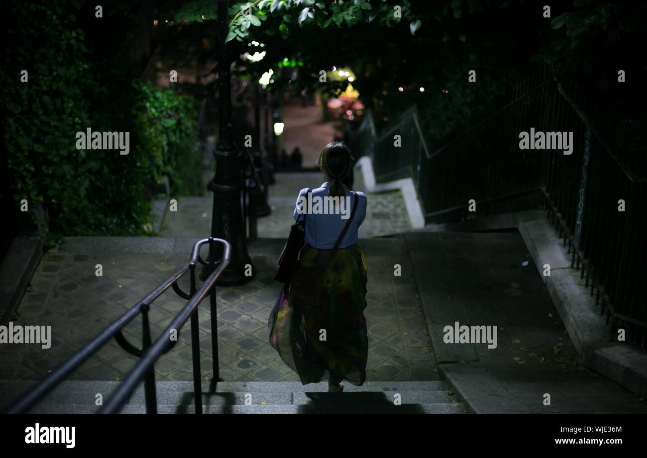 Woman walking alone night hi-res stock photography and images - Alamy