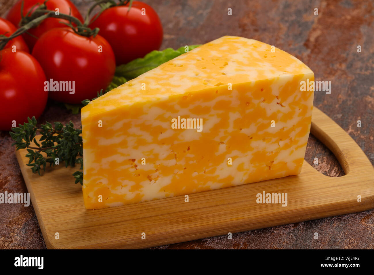 Marble delicous cheese served thyme Stock Photo - Alamy