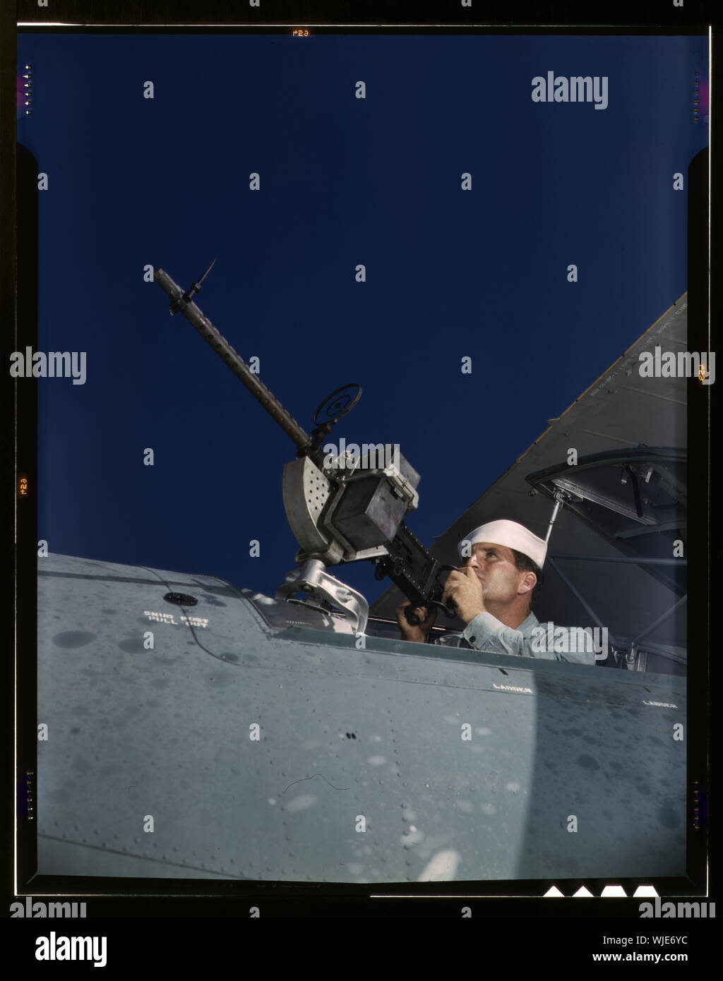 He's like to use that gun on the Axis. After seven years in the Navy, J ...