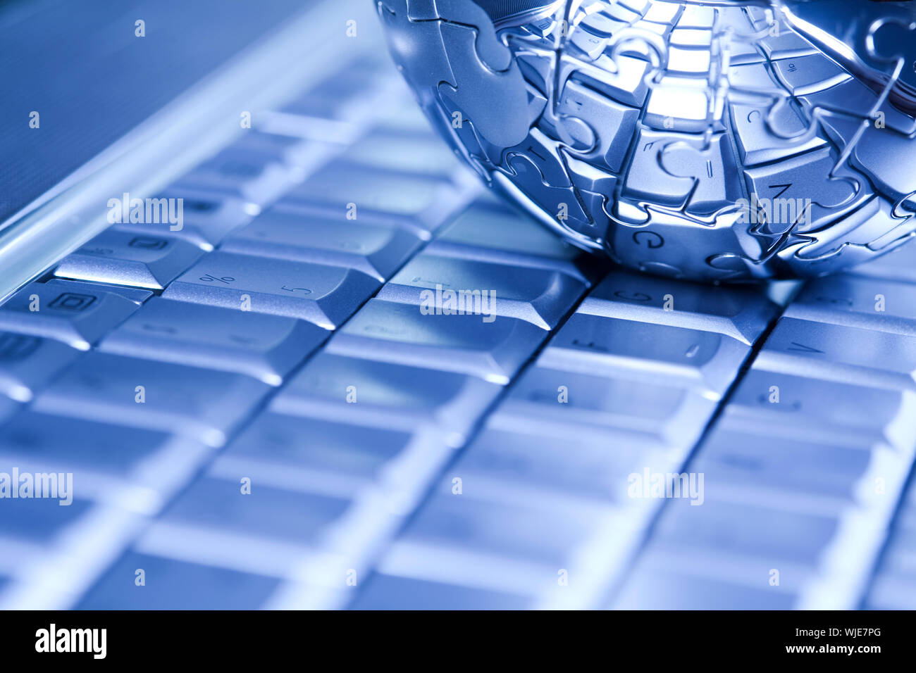 Chrome planet conception Stock Photo - Alamy