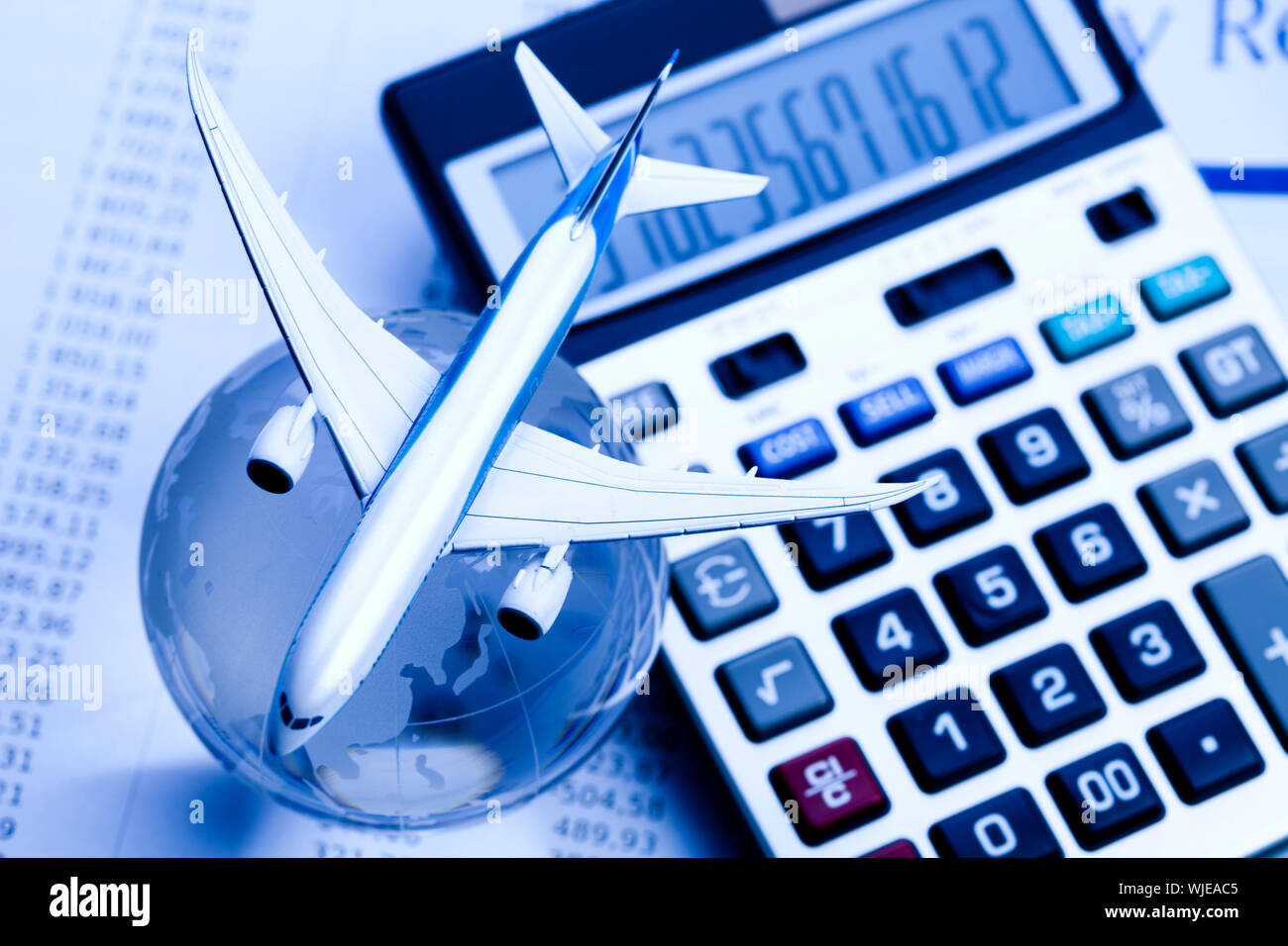 Airplane in finance and world Stock Photo - Alamy