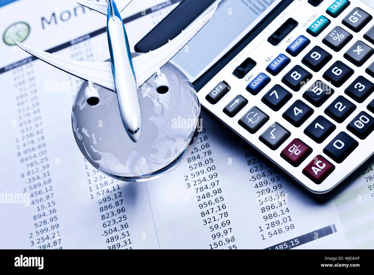 Airplane in finance and world Stock Photo - Alamy