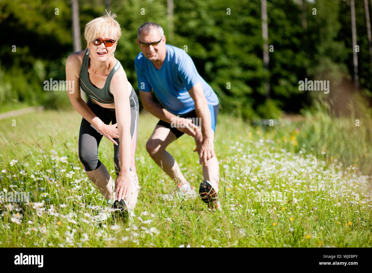 Mature couple doing sport outdoors Stock Photo - Alamy
