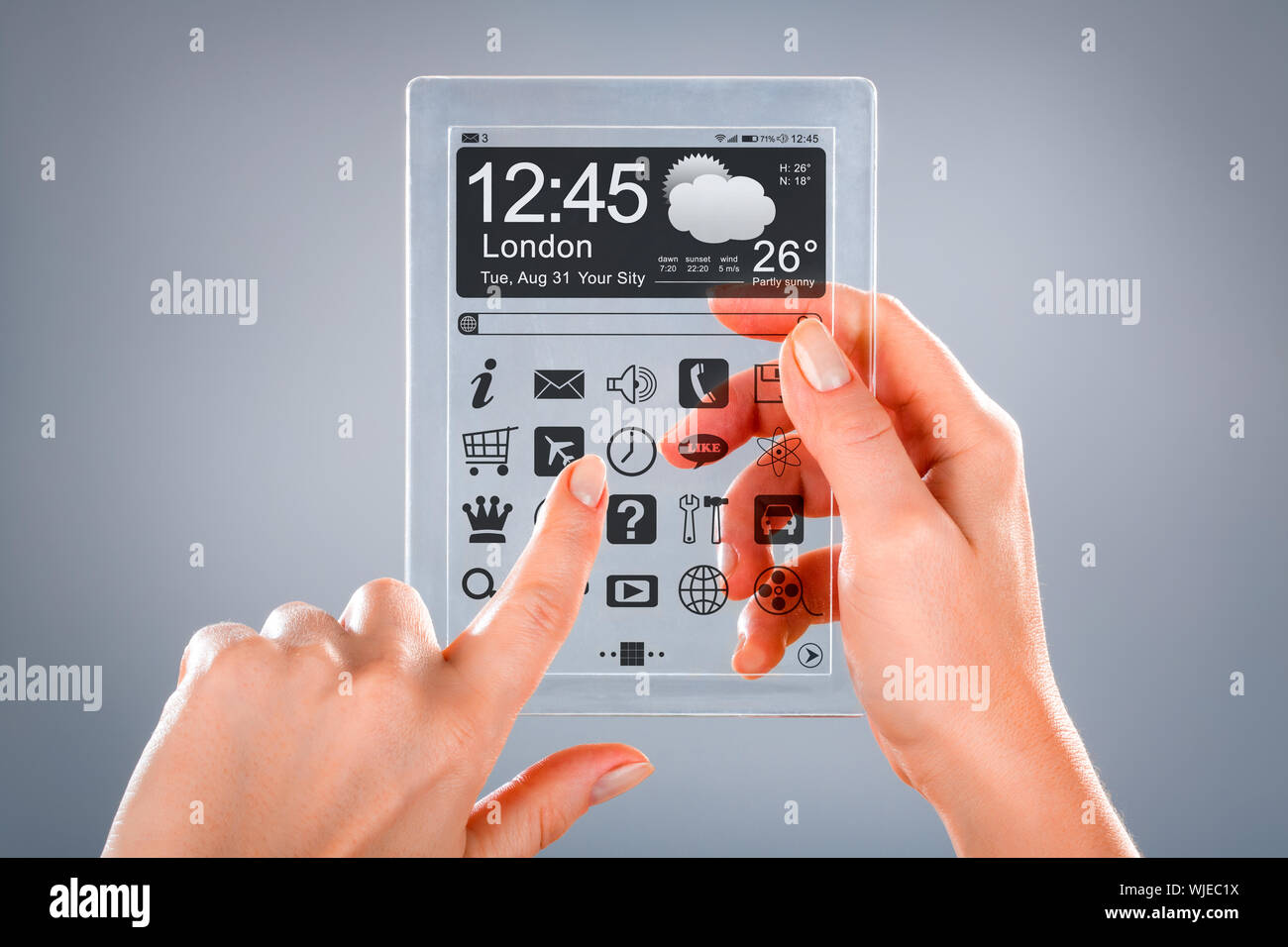 Tablet with a transparent display in human hands. Concept actual future ...