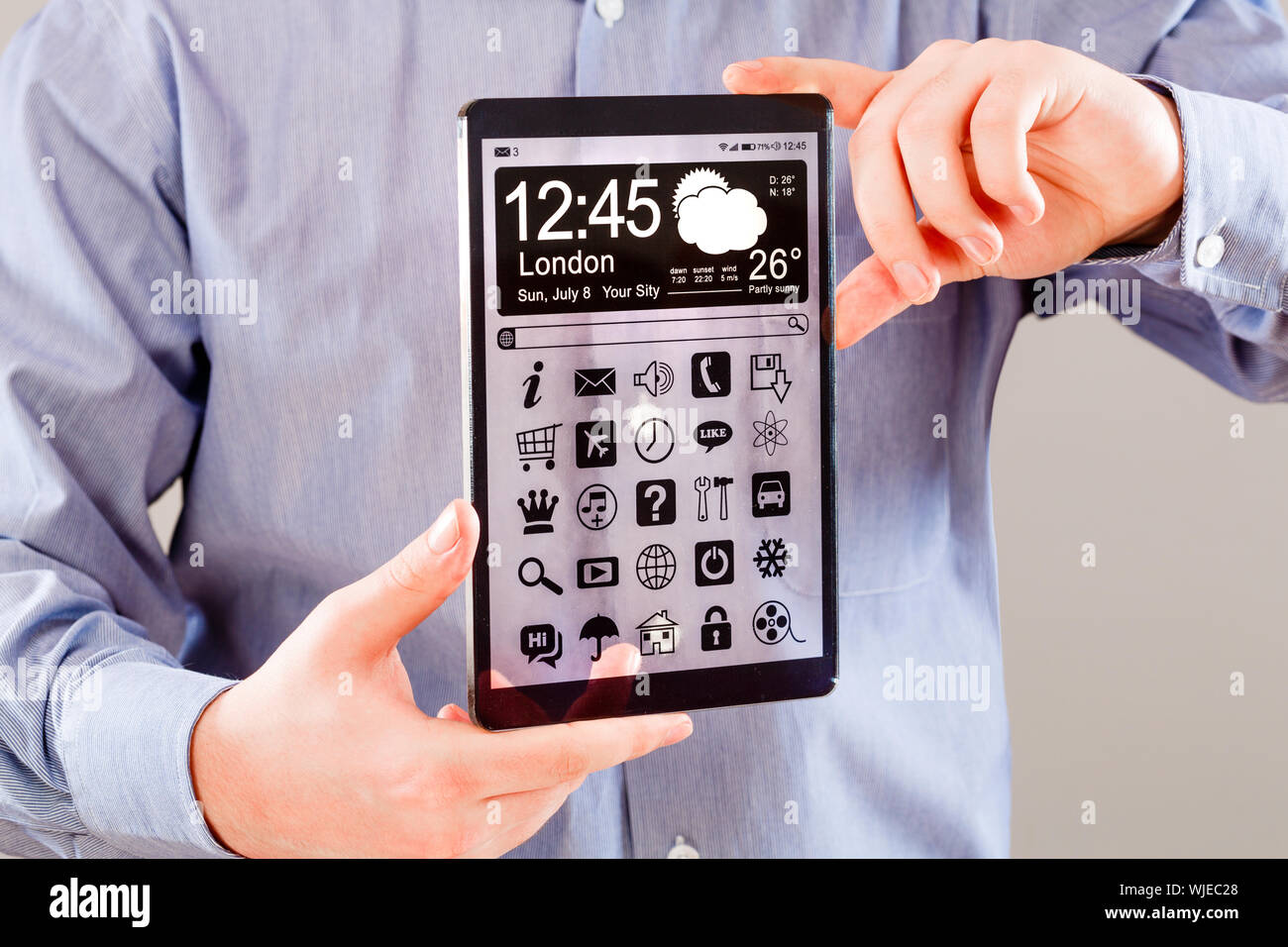 Tablet with a transparent display in human hands. Concept actual future ...
