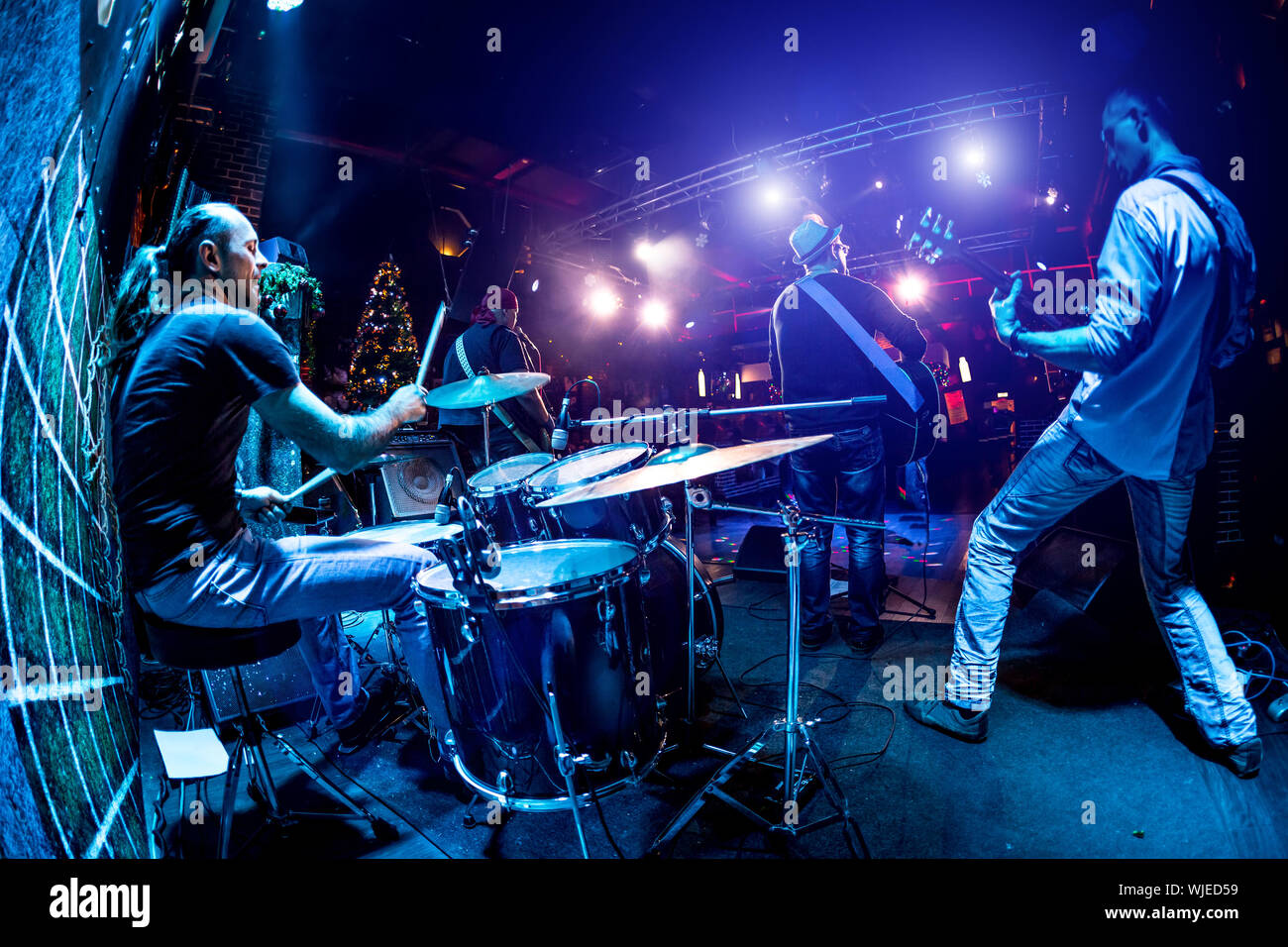 Band performs on stage, rock music concert Stock Photo - Alamy