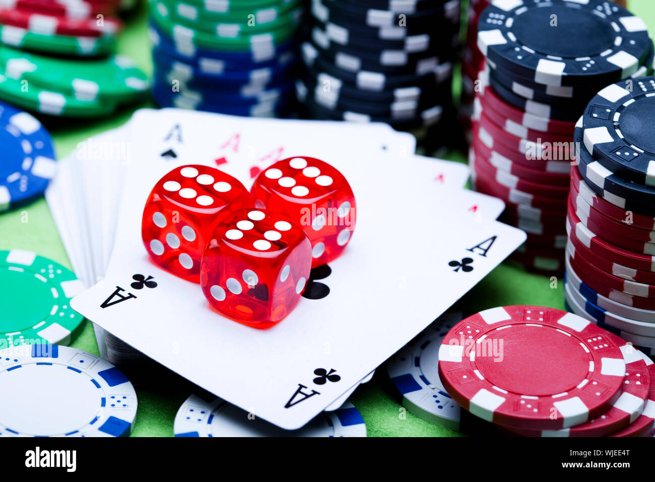 Play cards and dice hi-res stock photography and images - Alamy
