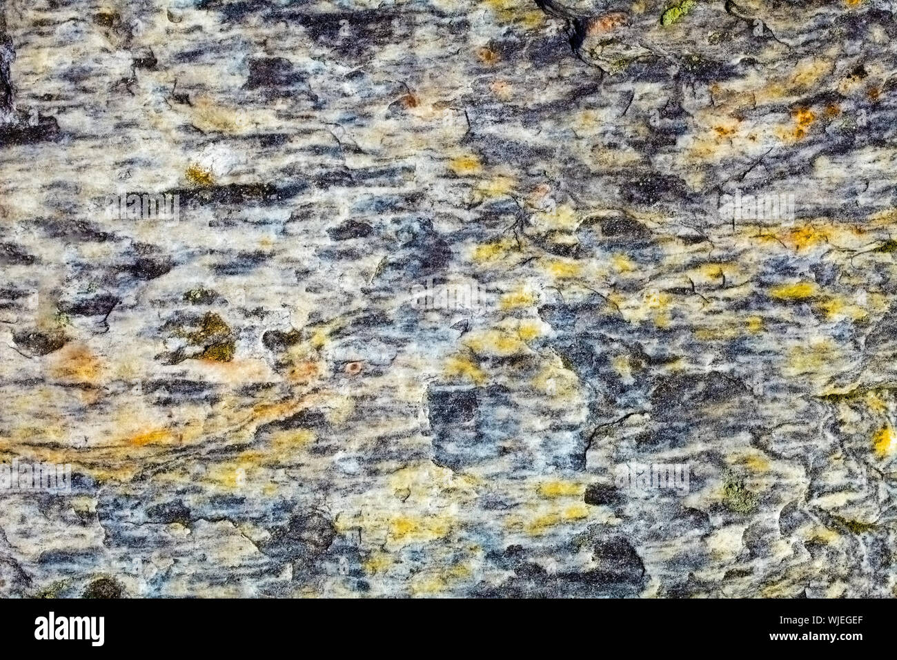 Surface of a raw natural rough stone Stock Photo - Alamy