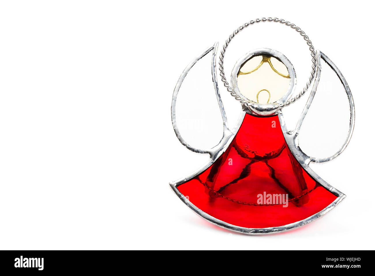 lead glass angel figurine on white background Stock Photo - Alamy