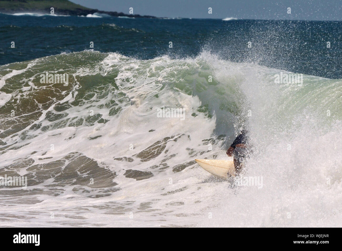 Surfer riding inside wave hi-res stock photography and images - Alamy
