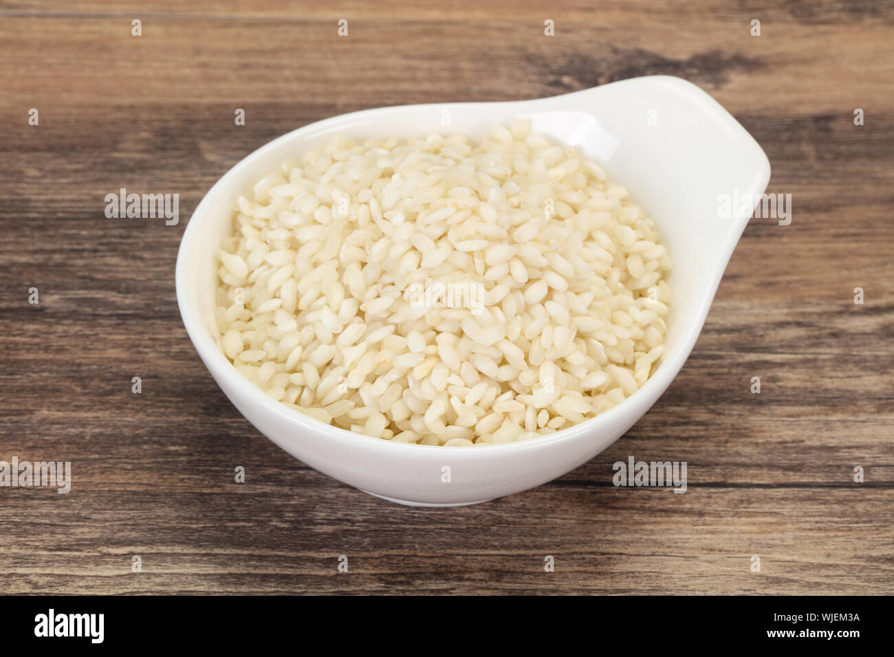 Raw Arborio rice for Italian risotto Stock Photo - Alamy