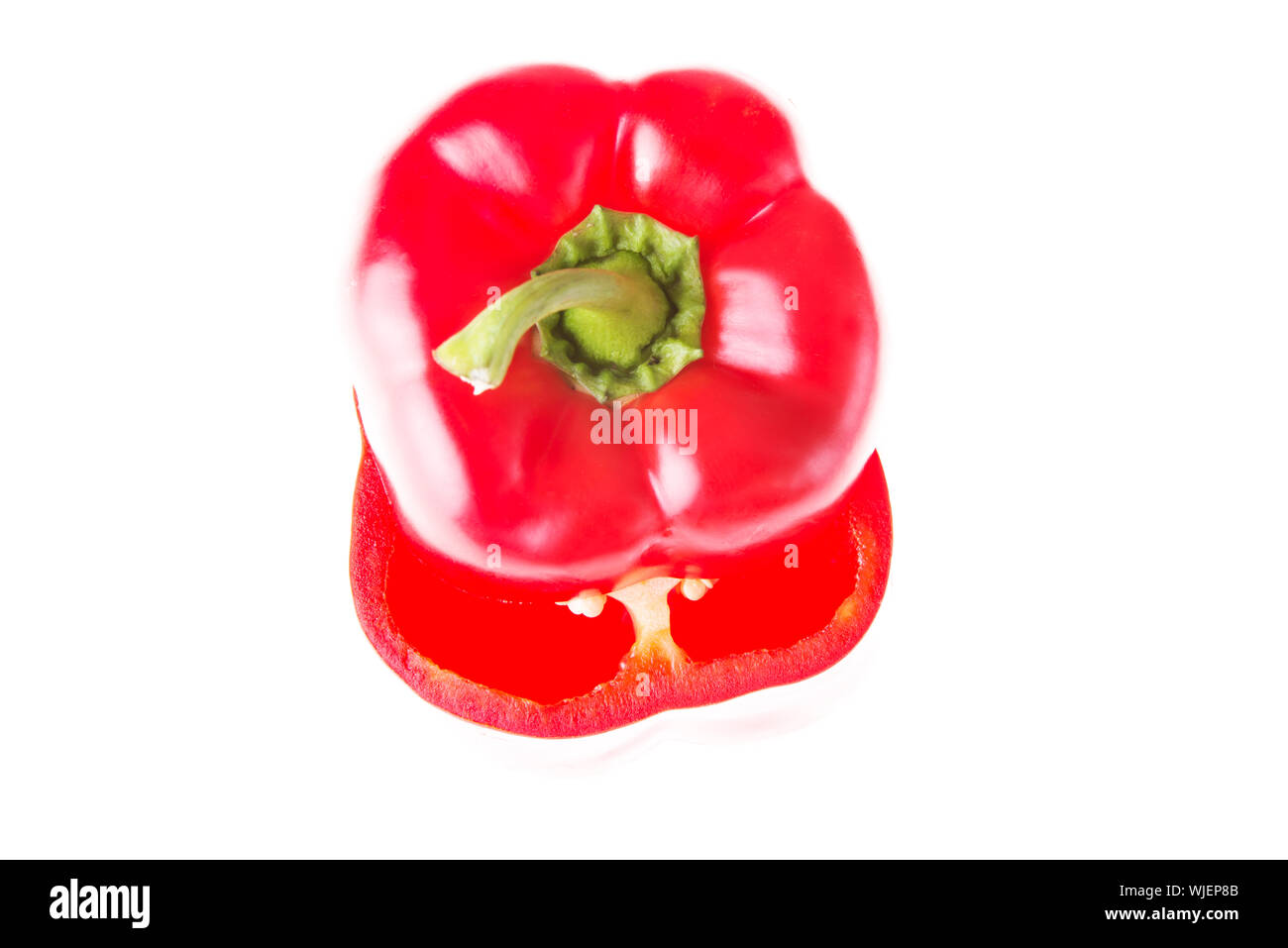 Two red paprika vegetable. Isolated on white Stock Photo - Alamy