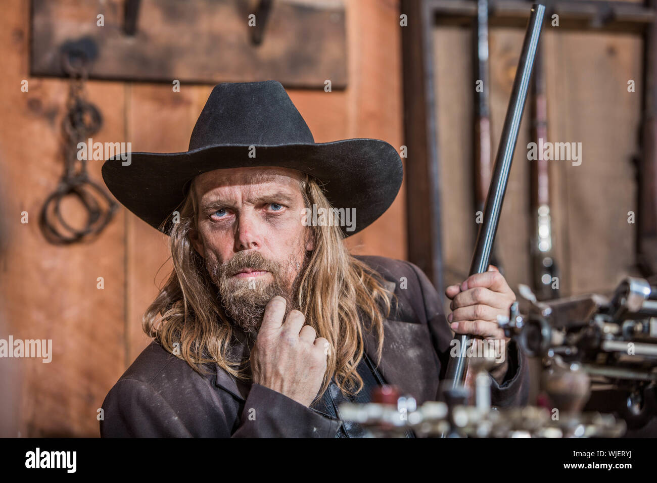 Portrait of a Stern Cowboy Stock Photo - Alamy