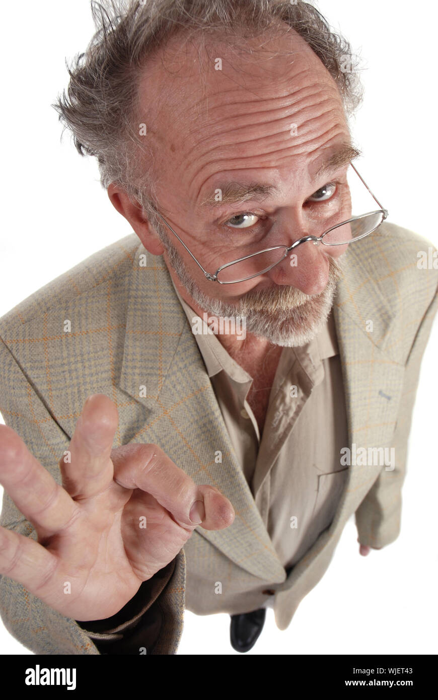 Wacky professor making "ok" gesture Stock Photo - Alamy