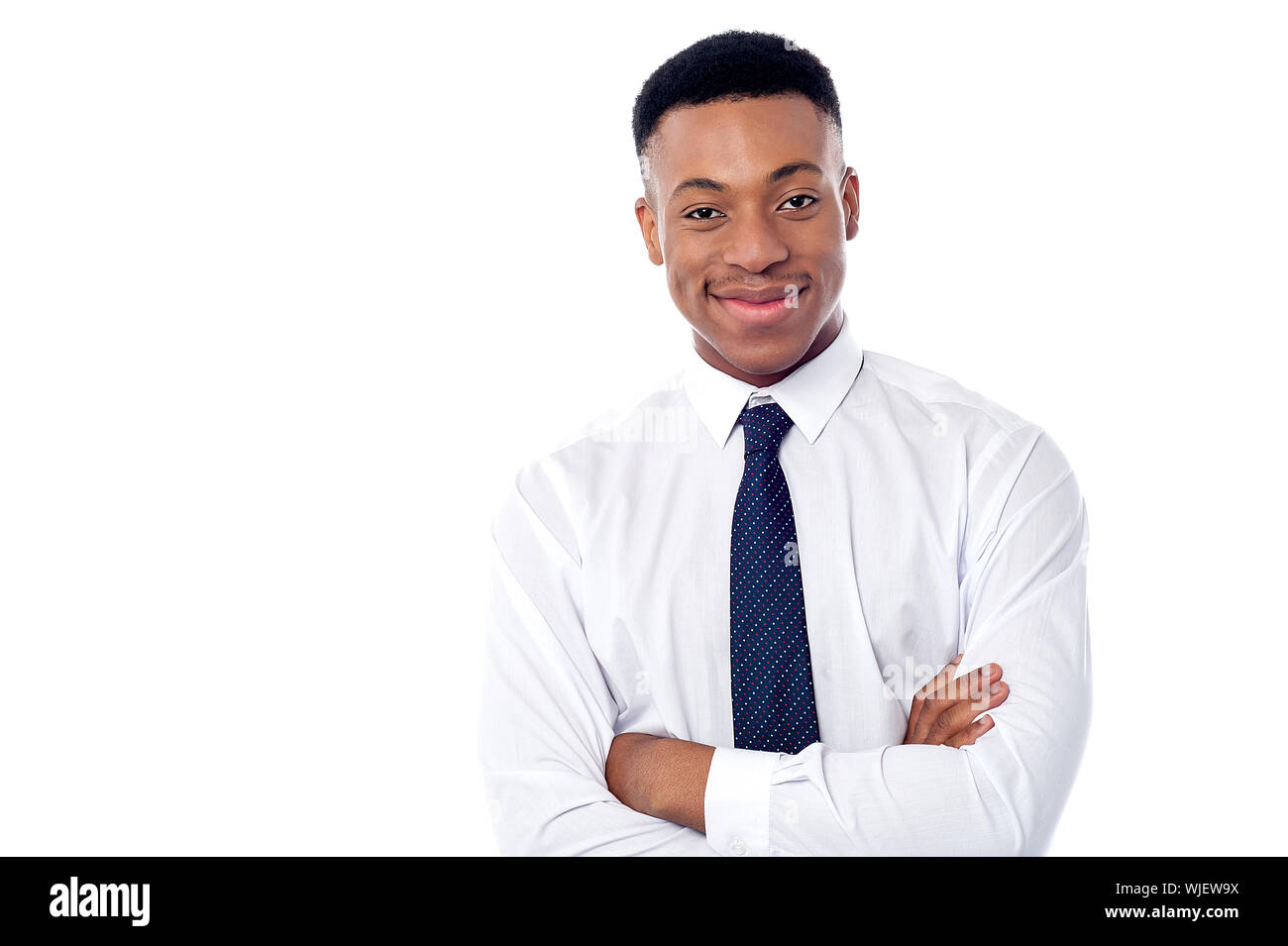 Handsome male executive posing with confidence Stock Photo - Alamy