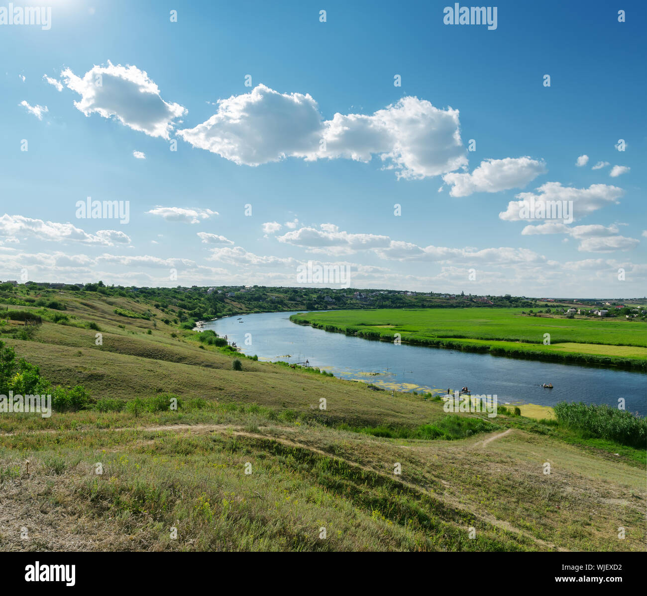 blue sky with clouds over river Stock Photo - Alamy