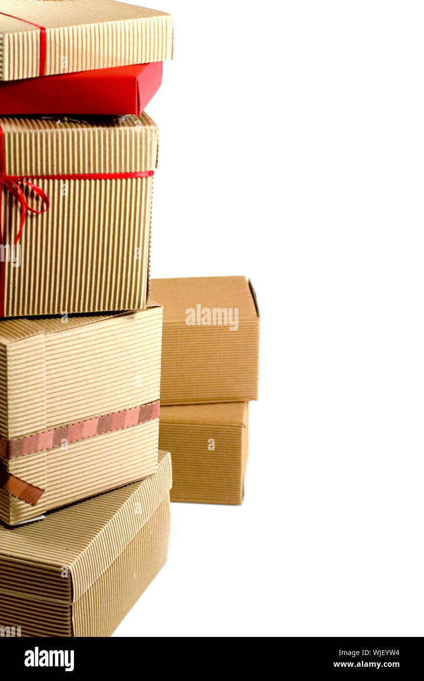 stack of cardboard boxes close up on white background Stock Photo - Alamy