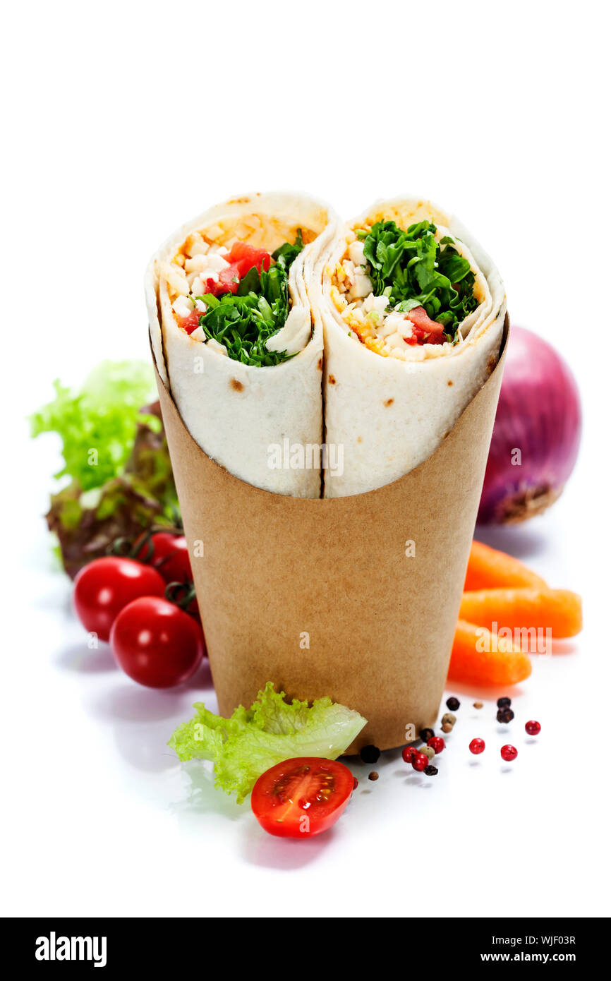 tortilla wraps with chicken and fresh vegetables isolated on white ...