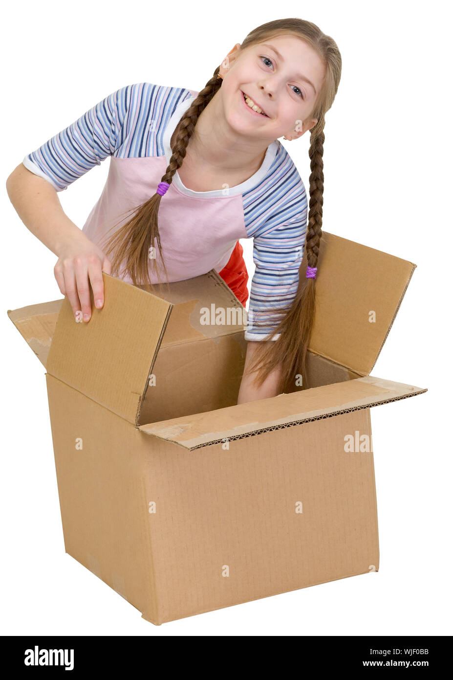 Girl thrust the hand into cardboard box on white Stock Photo - Alamy