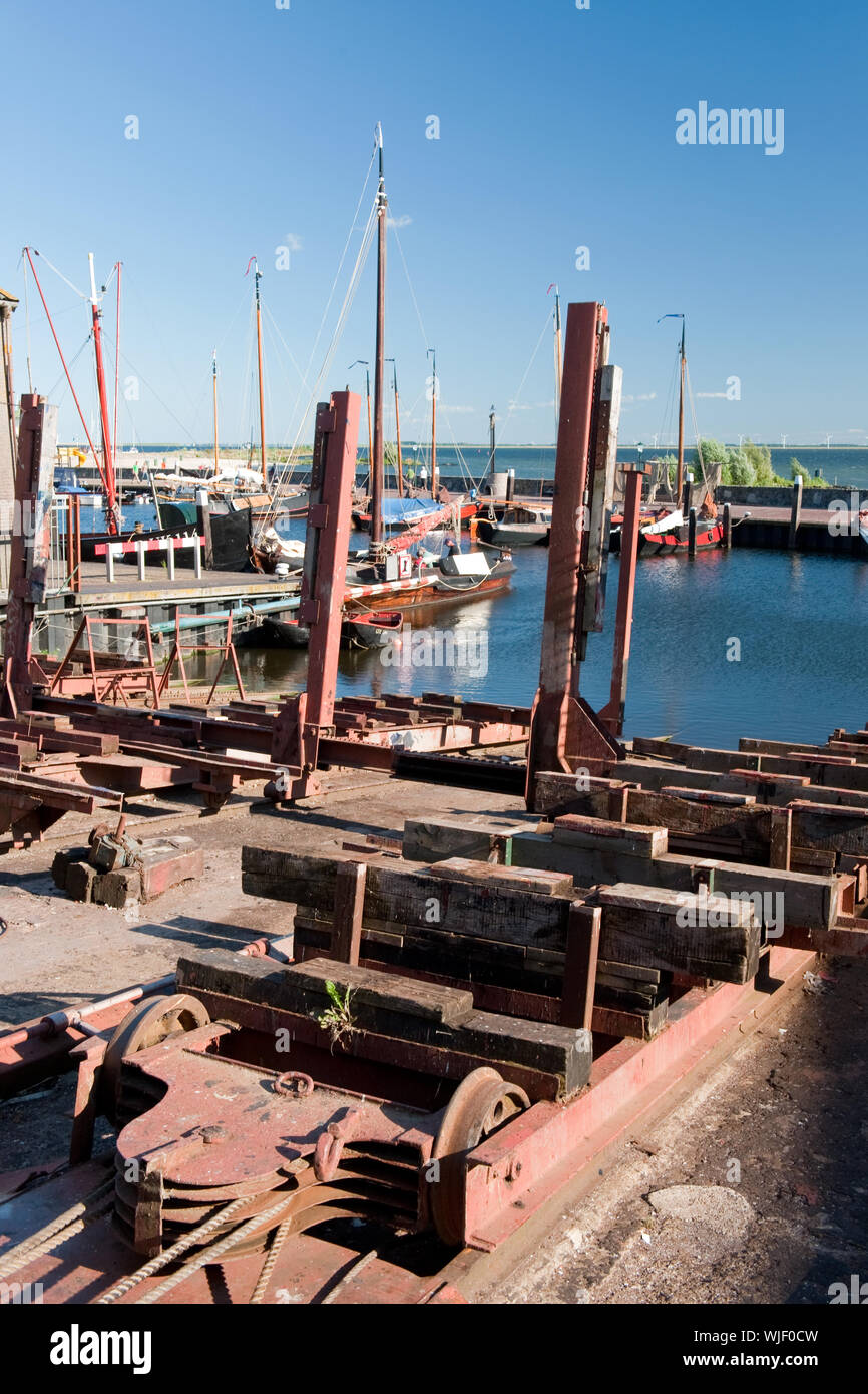Boat wharf in a small Duthc fishery village Stock Photo - Alamy
