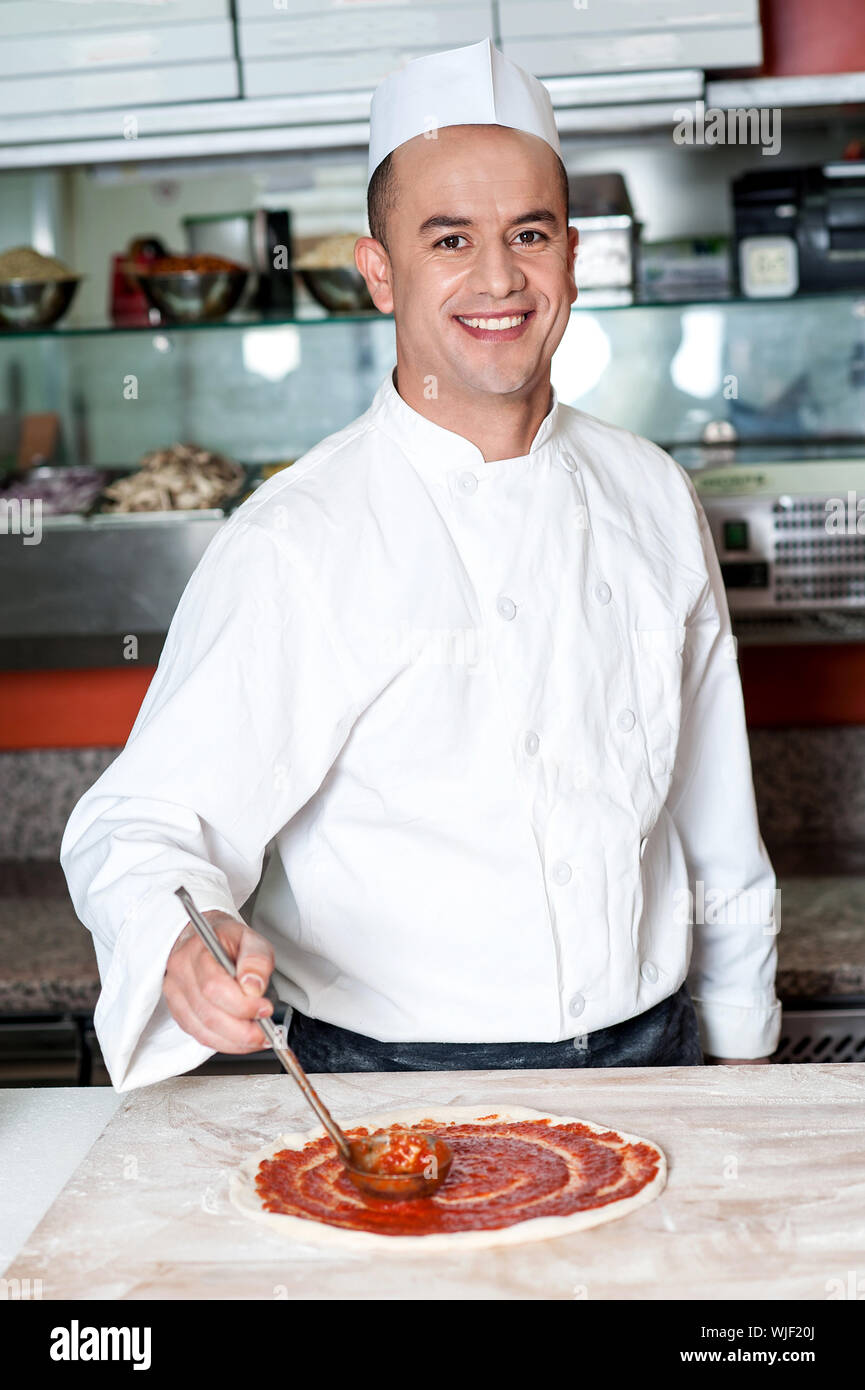 Professional chef making base preparation hi-res stock photography and ...